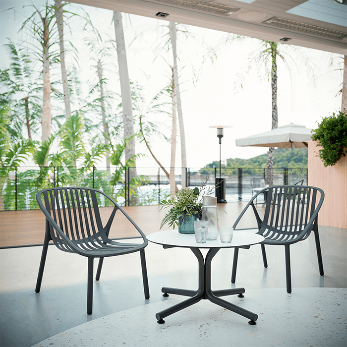 Bini 27.6” Polypropylene Round Lounge Side Table with HPL Top - Pool ...